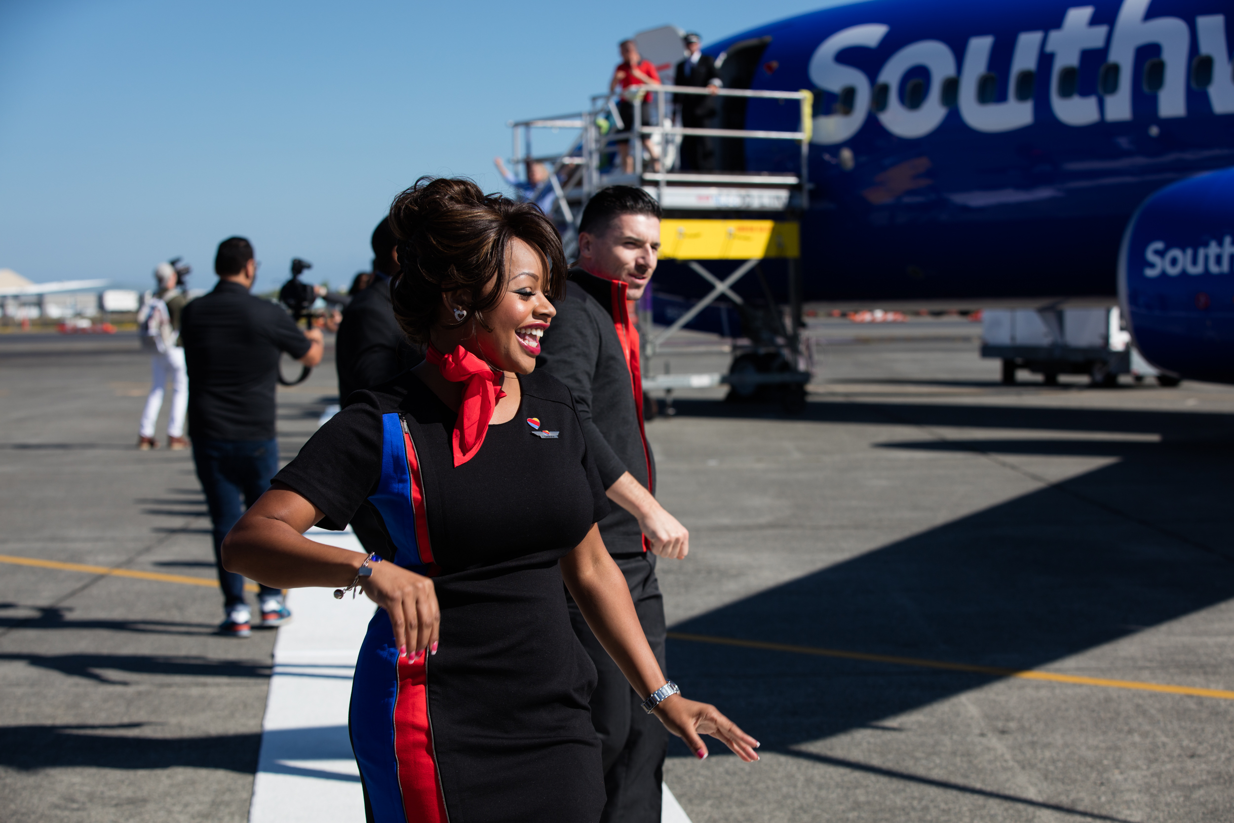 See Southwest Airlines employees show off their new uniforms at 35,000 ...